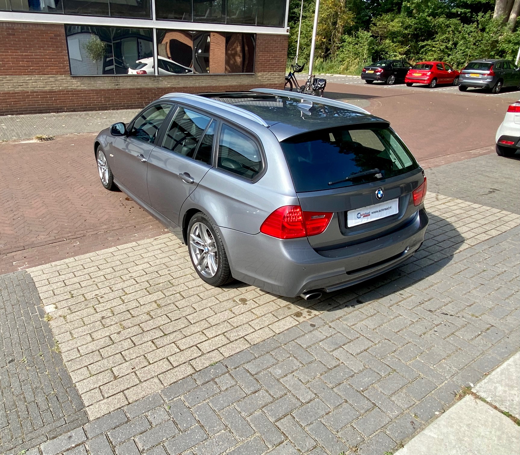 BMW 320i Touring M-Sport E91 - Mei 2011 - AutoRaad